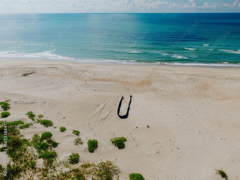 Turtle nesting ground surrounded by a protective netting on the beach ...