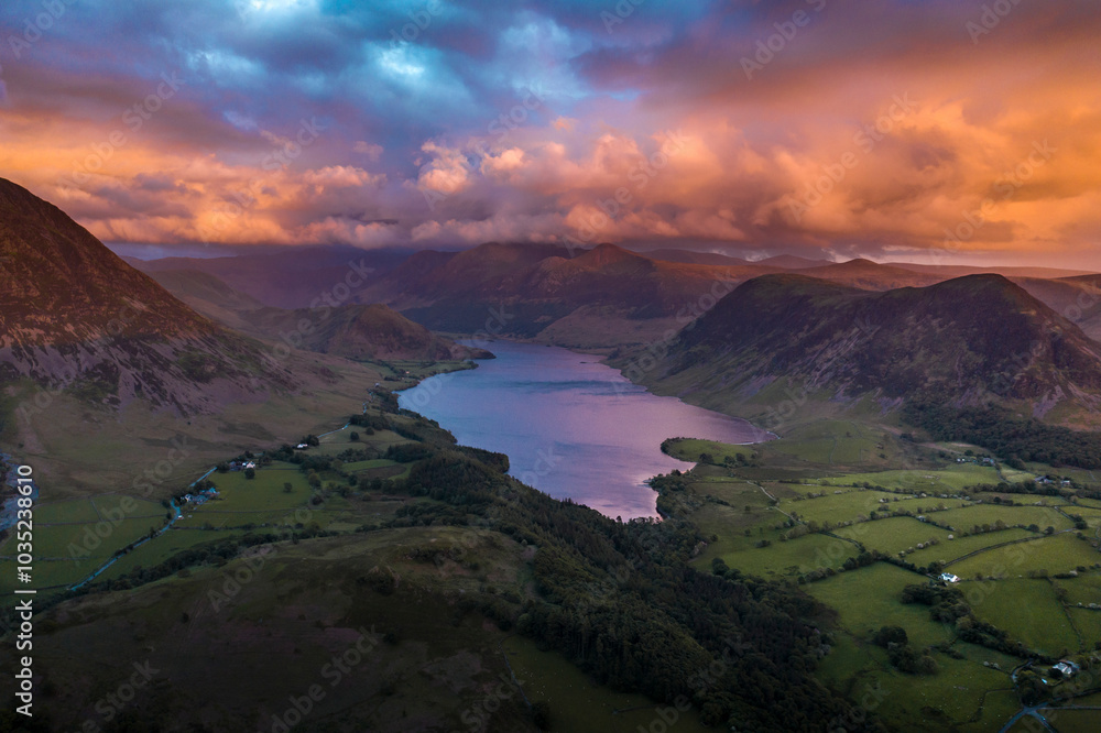 Aerial view of beautiful Buttermere lake surrounded by majestic ...