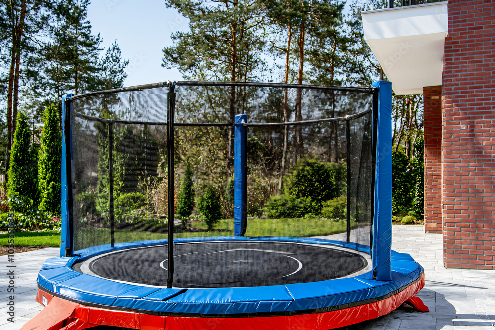 properly installed trampoline safety enclosure in backyard setting ...