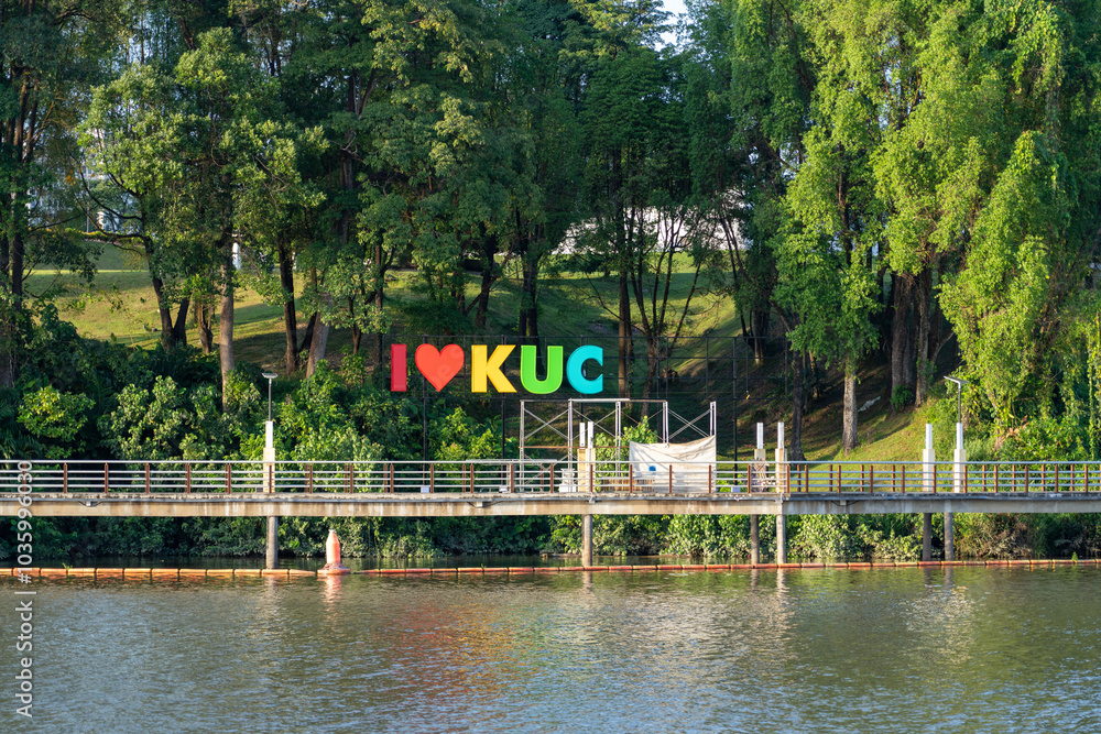 I LOVE KUCHING sign under construction on Kuching River, only reads "I LOVE KUC" in rainbow ...