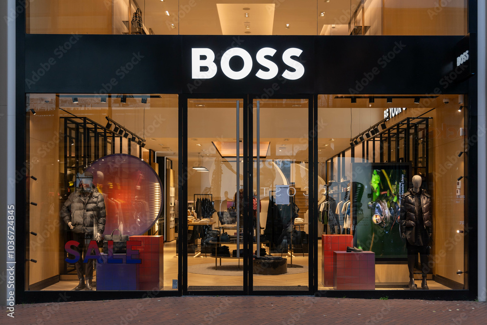 Boss shop window and logo sign. Hugo Boss as one brand name. Years ago ...