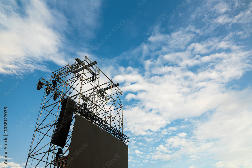 Overhead stage rigging equipment Concert stage with outdoor lighting ...