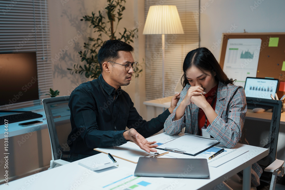 Businessman comforting his sad coworker while working together with ...