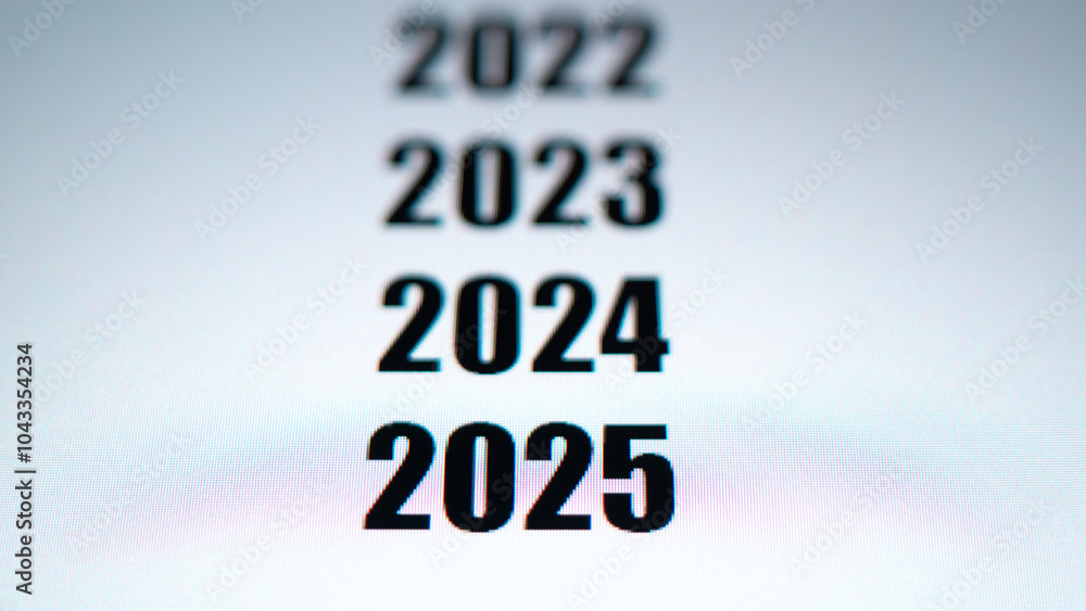 The years 2022 to 2025 are shown in bold text on LED display, gradually ...
