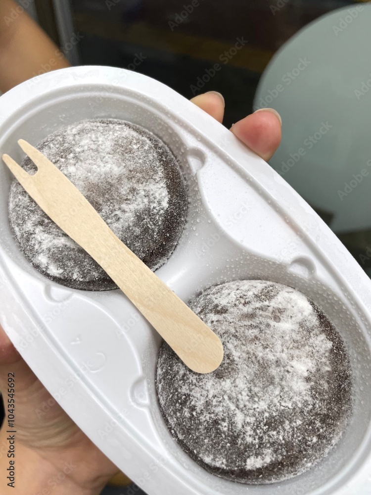 Mochi is a Japanese cake made from glutinous rice, pounded until it is ...