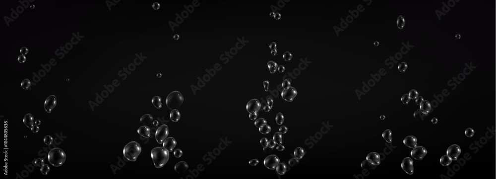 Fizzy water bubbles floating on dark background. Multiple transparent ...