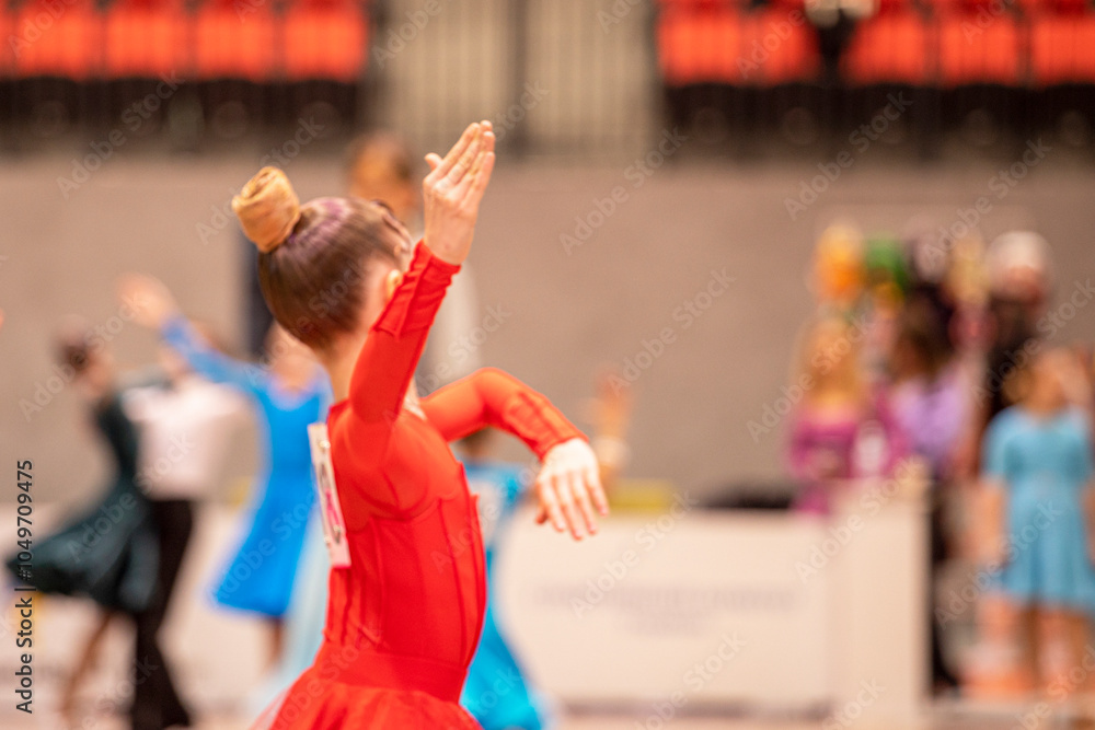 profile happy girl with a slicked back and wet wave hairdo dancing solo ...