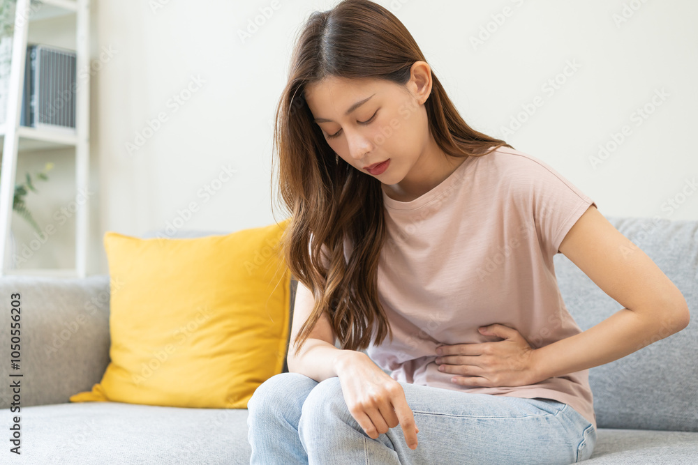 Flatulence asian young woman intolerance hand in stomach ache, suffer ...