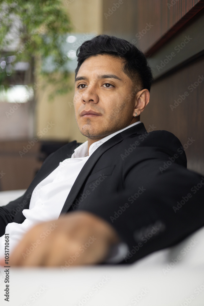 Glamorous lifestyle of a relaxed male model wearing formal clothes and ...