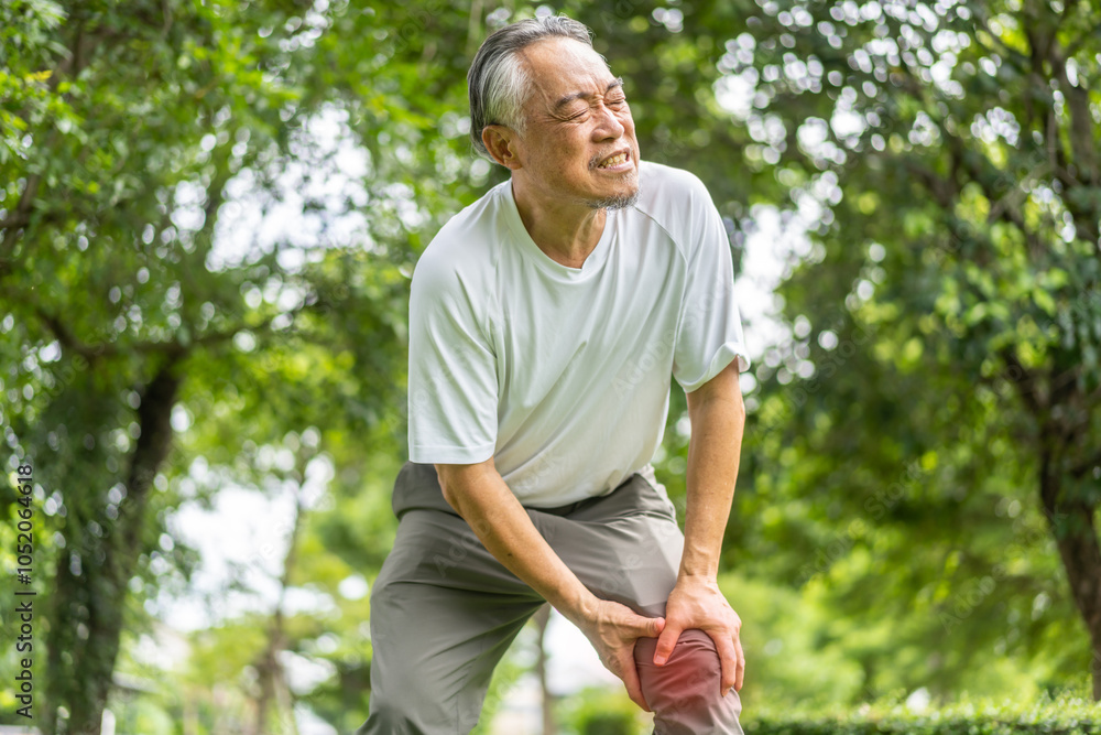 Foto de Stock Sick unhappy senior adult elderly asian man touching her ...