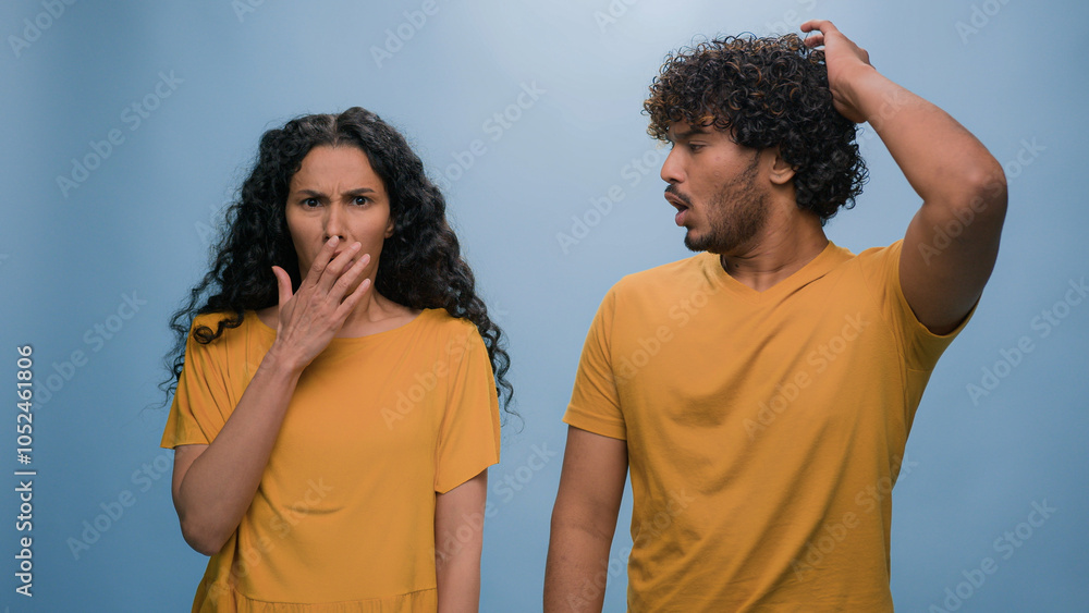 Multiracial shocked scared afraid couple amazed shocked Hispanic woman ...