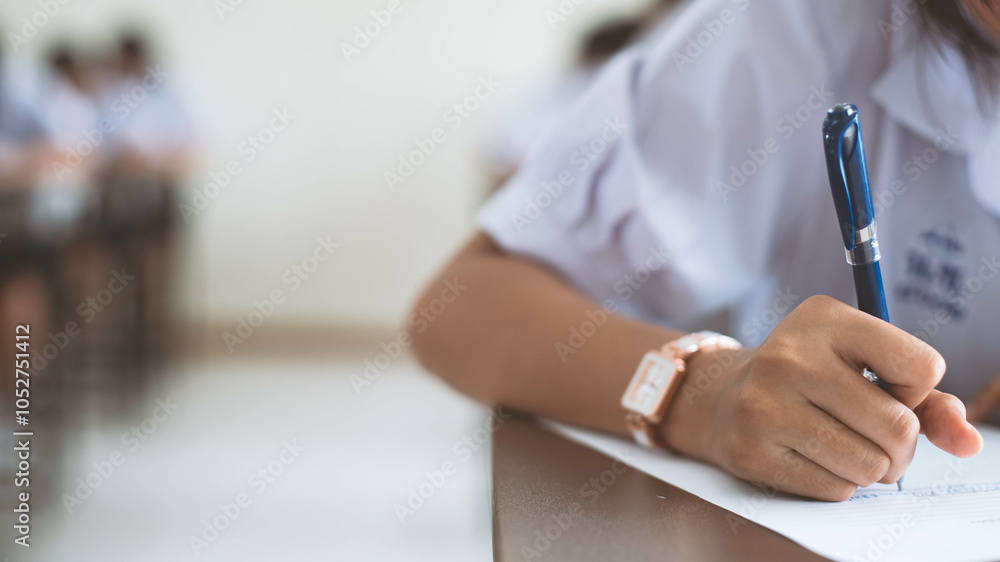 Assessment examination of high school students dressed in uniform.The ...