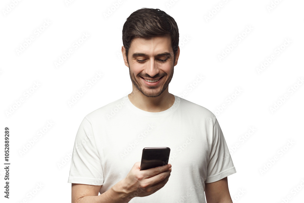 Young man holding phone in one hand and smiling happily while looking ...