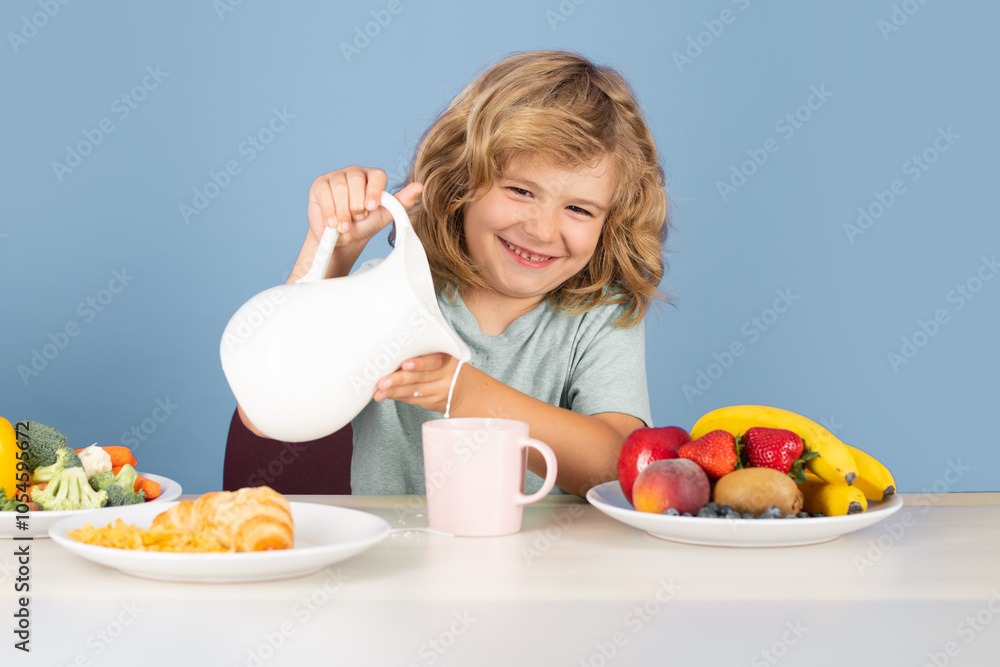 Closeup face of kid eating organic food, yogurt, milk. Child healthy ...