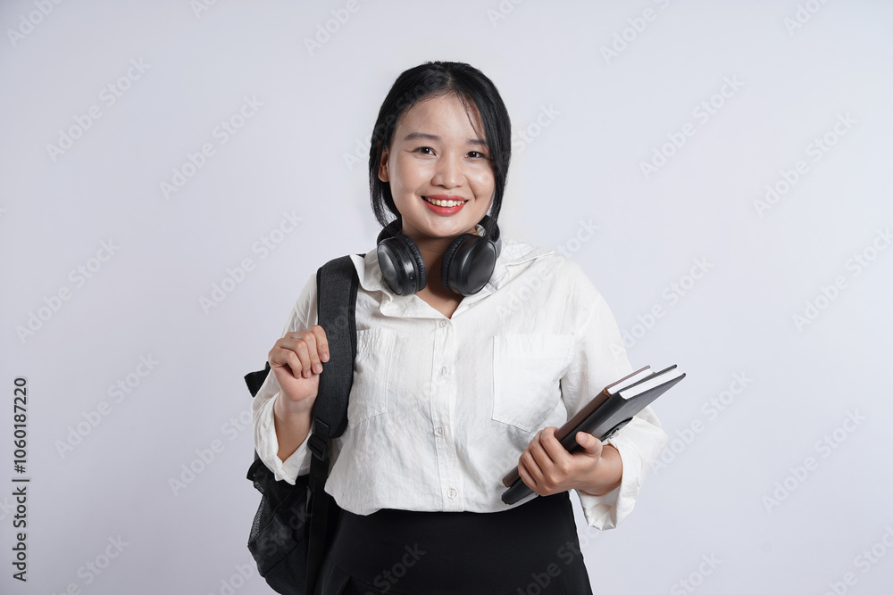 Young, obese, plus-sized Asian student wearing a white shirt and ...