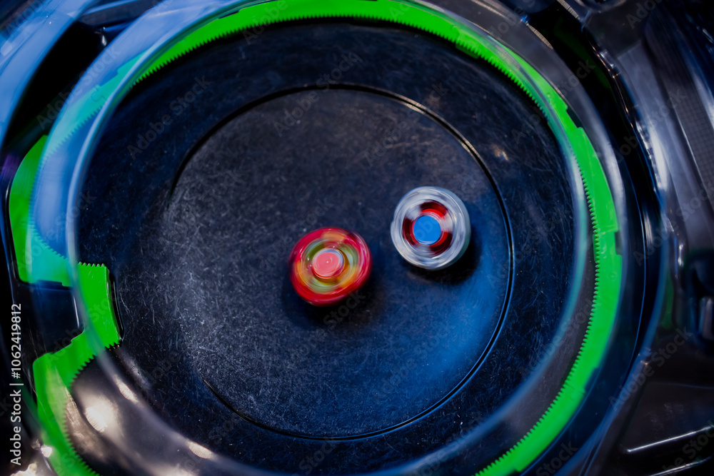 Beyblade battle of spinning toys in a fight of a Japanese origin game ...