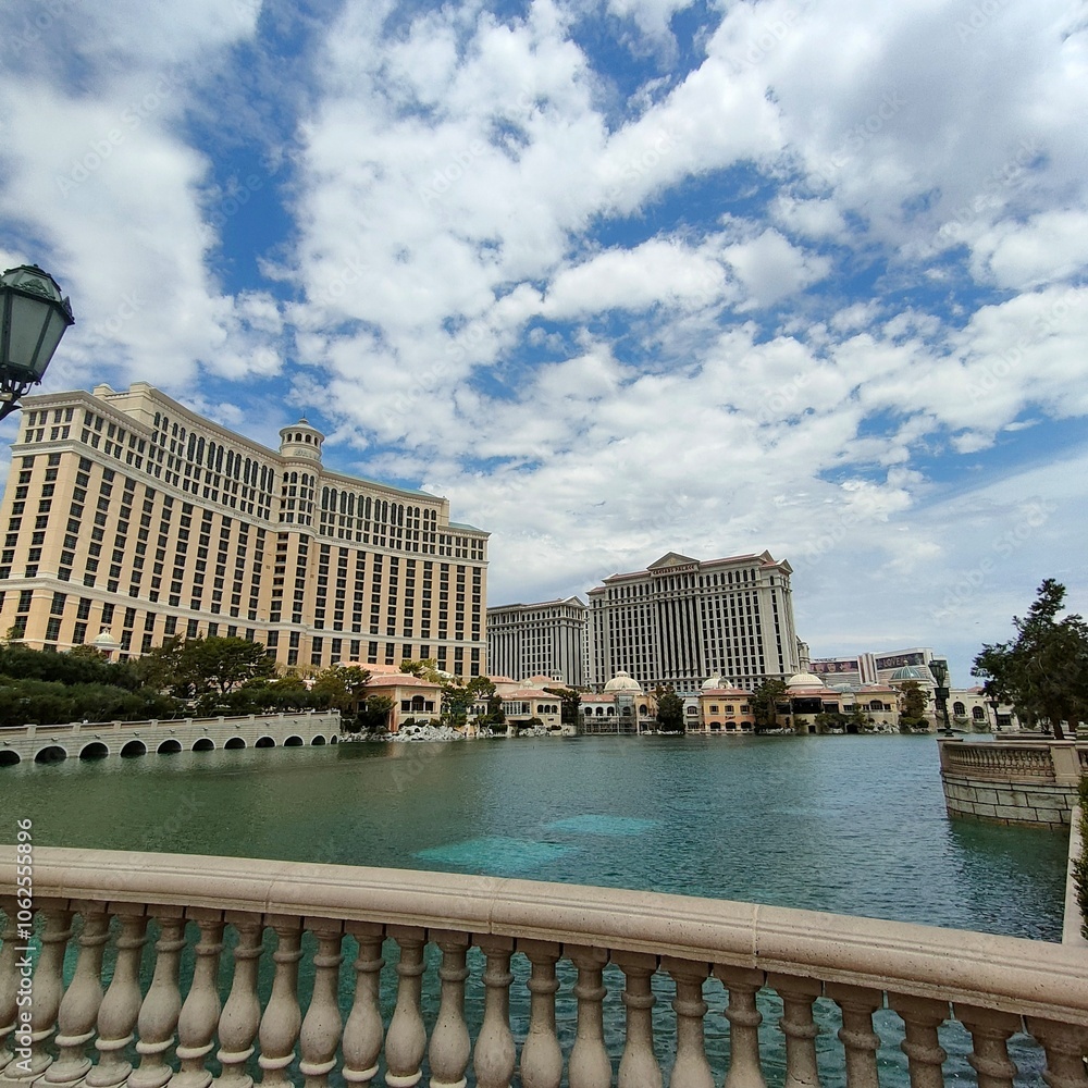 An open view of the Bellagio Hotel and Caesar's Palace with a lake in ...