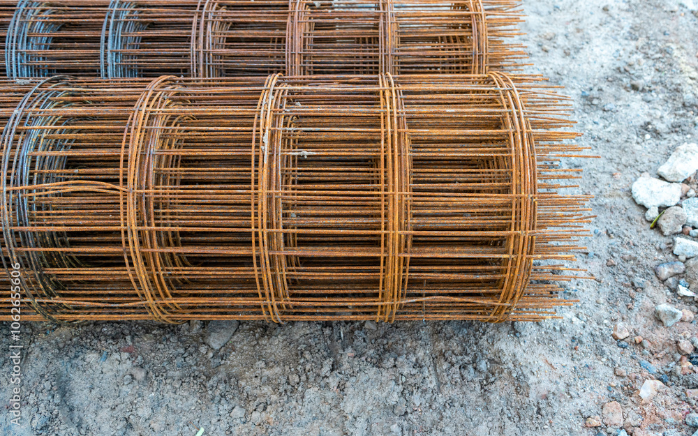 Rolls of steel wire mesh used in construction, fencing, and as a ...