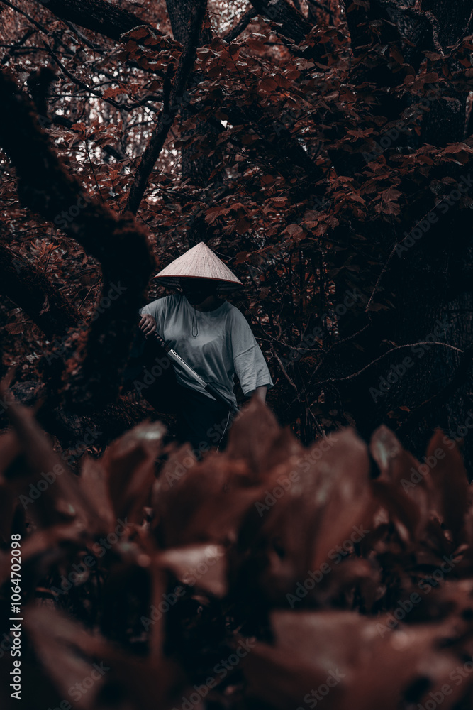 Vertical. A mysterious samurai warrior walks confidently through a dark ...