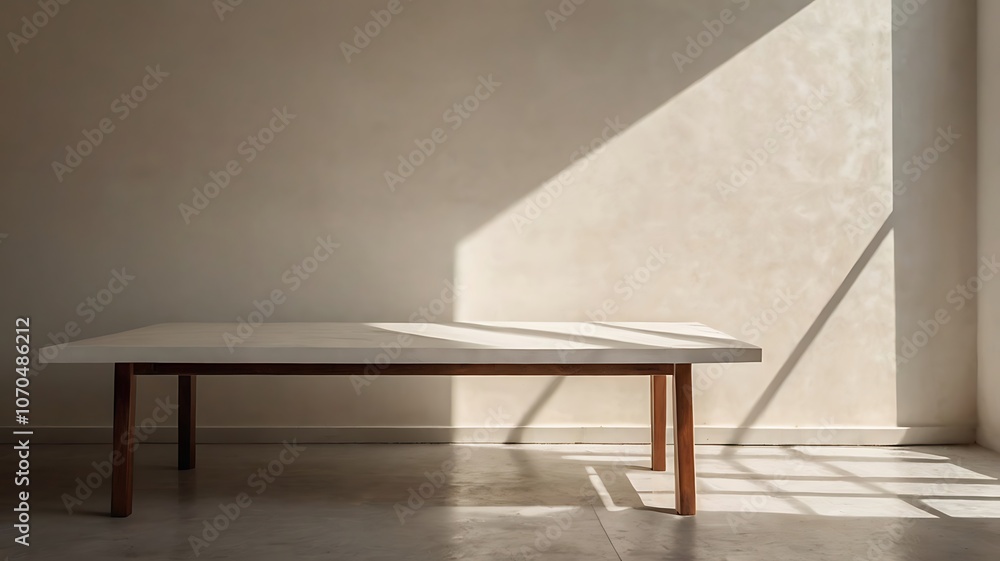 White table with white brick wall texture background, shadow window on ...