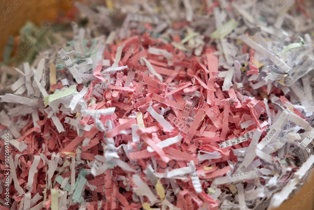 Shredded documents in a recycle bin. Private or business data that is ...