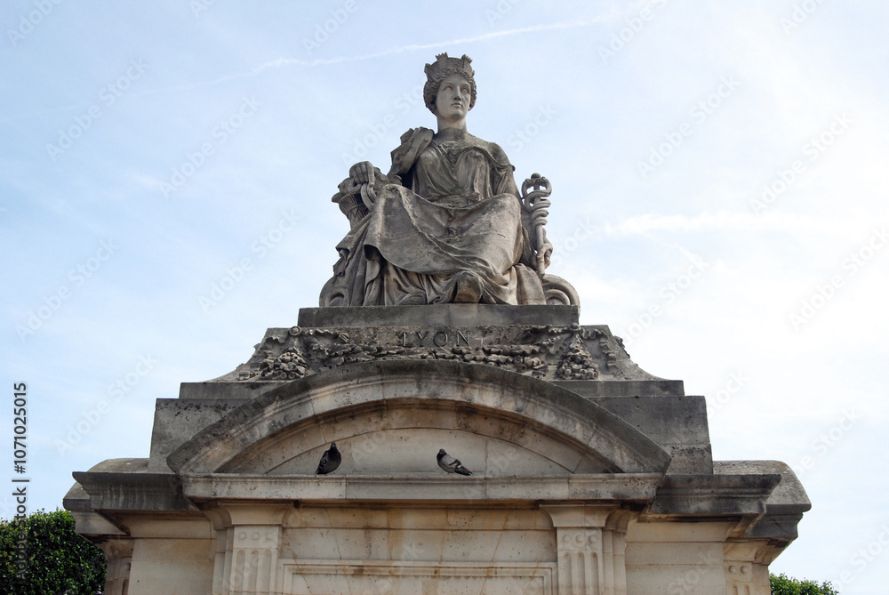 Statue of Lyon woman in honor of the city in Paris capital of France on ...