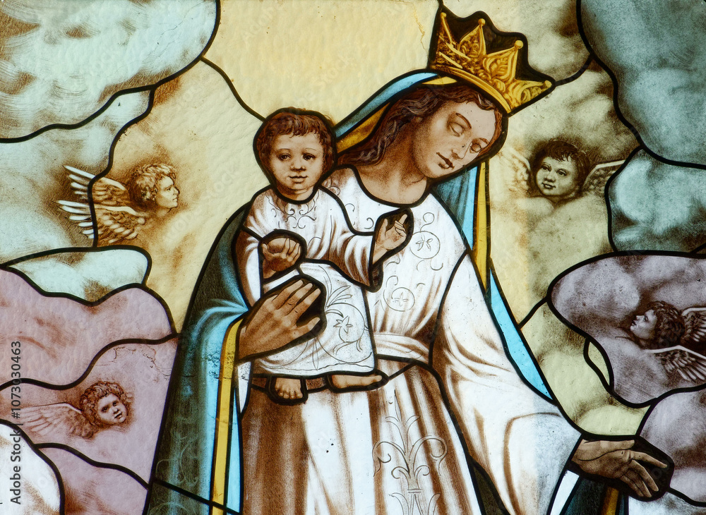 Stained glass (19th century) of Blessed Virgin Mary in heaven holding ...