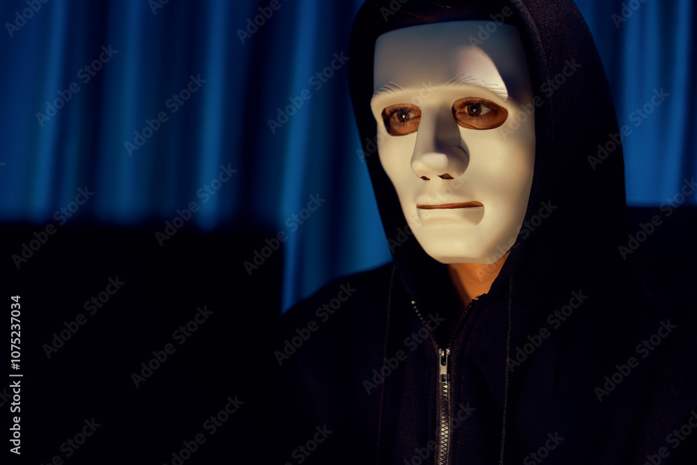 Photo Stock White criminal anonymous mask installing coding password encryption by programming ...