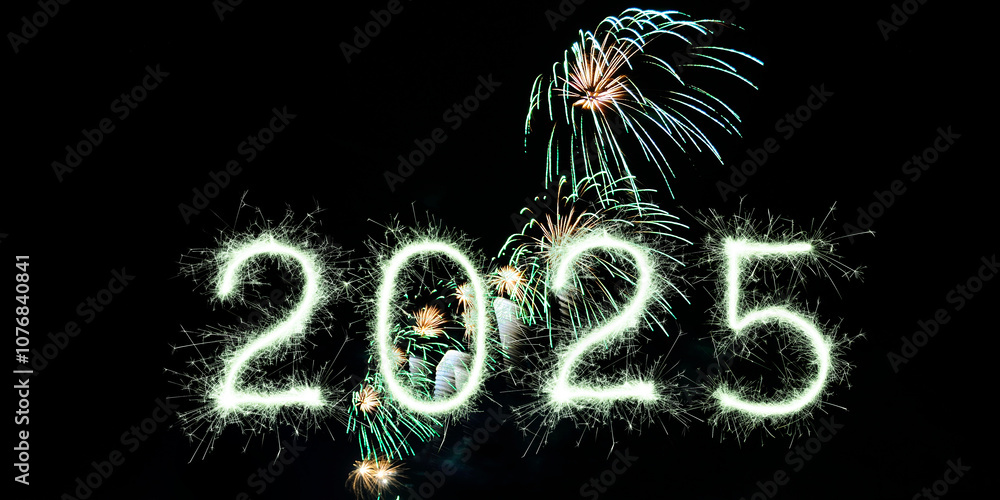 Sparkler 2025. Firework illumination on dark sky background, happy new ...