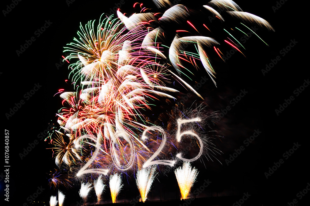 Sparkler 2025. Firework illumination on dark sky background, happy new ...