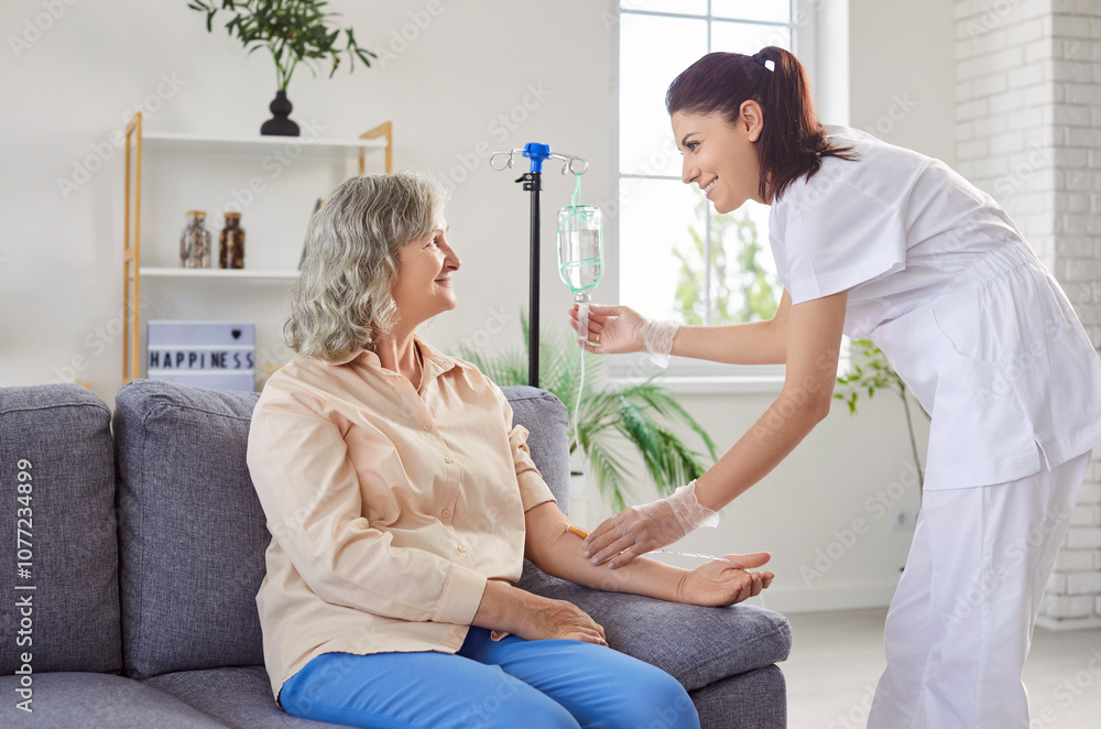 Young friendly nurse or caregiver help sick senior elderly woman ...