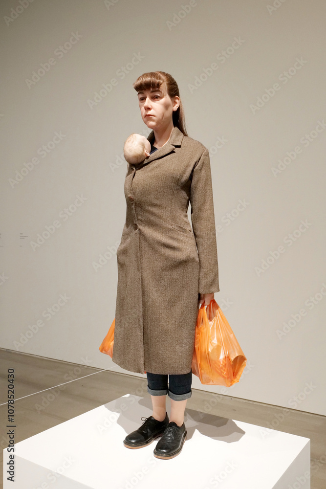 Aarhus, Denmark 11 06 2024 The hyper realistic sculpture of Mother with ...