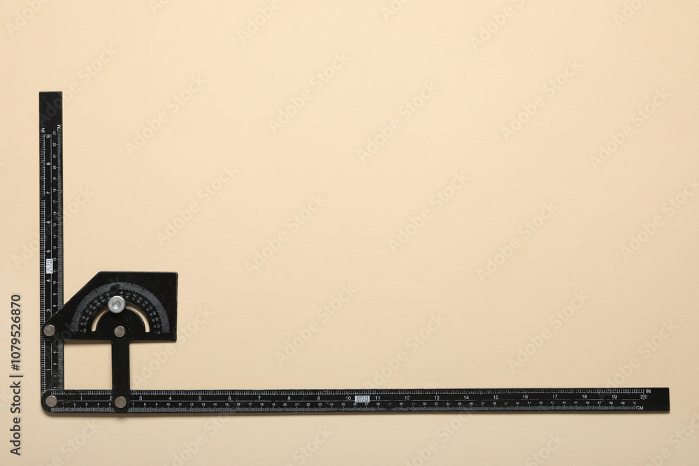 Builder's ruler on color background Stock Photo | Adobe Stock