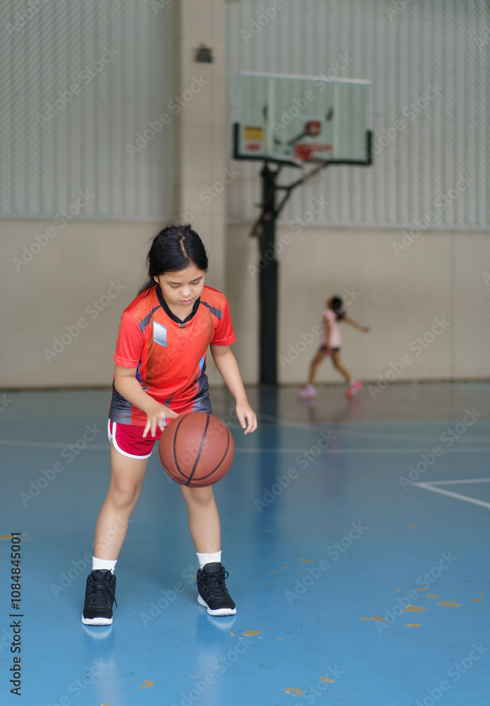 basketball by asian child or kid girl fun playing and training to ...