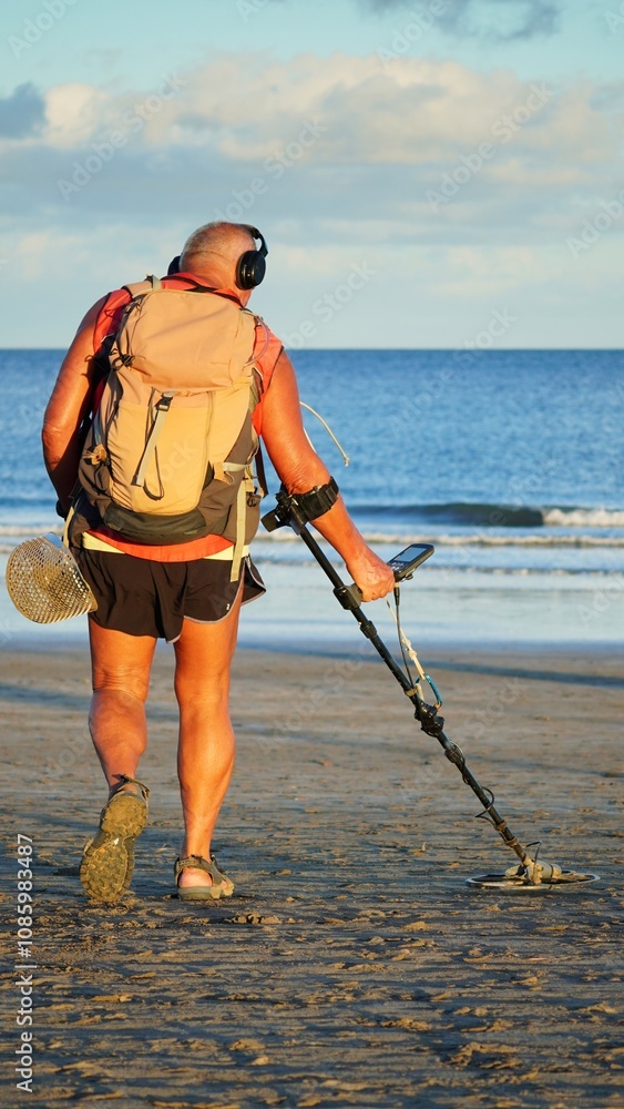 Gold Digger. Senior treasure hunter searching for jewels with metal ...