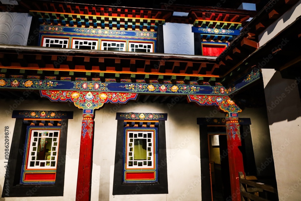 Traditional Tibetan house with vibrant wooden carvings and intricate ...