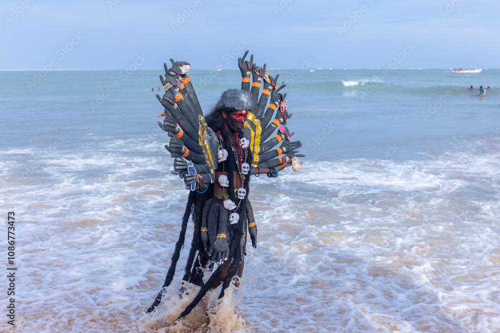 Kulasai Dasara, Portrait of indian male with painted face and dressed ...