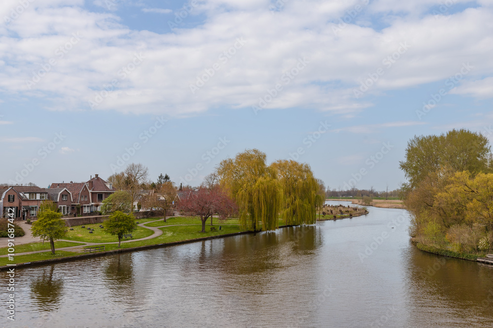 Small village of Asperen on the river Linge in the Betuwe in the ...