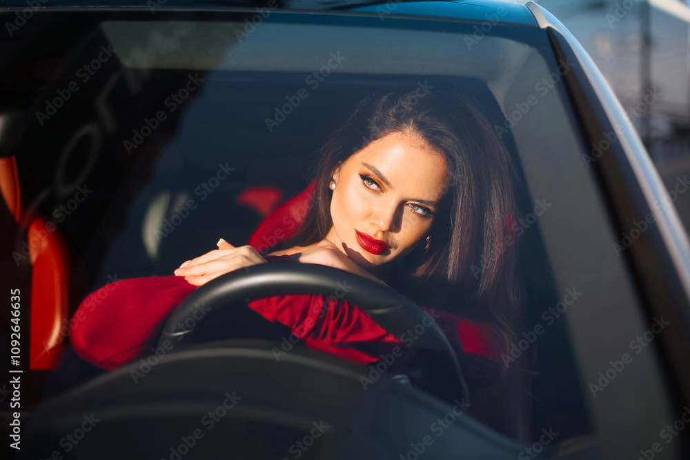 Beautiful Smiling woman driving car in red, attractive girl sitting in ...