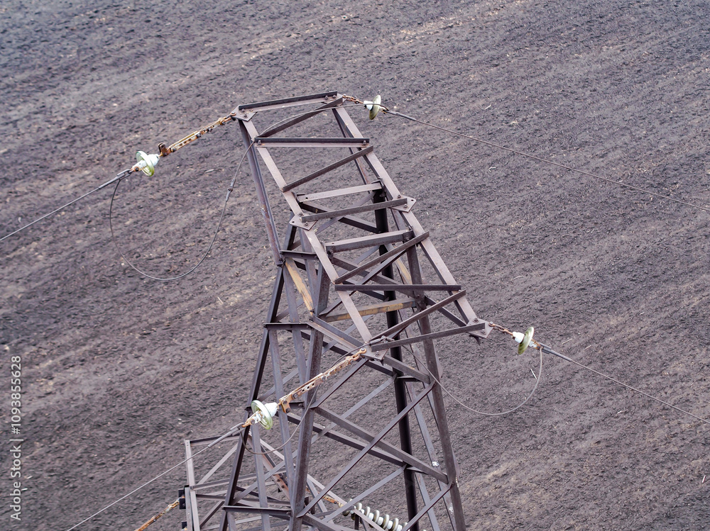High -voltage transmission lines with a metal rusty fastening ...