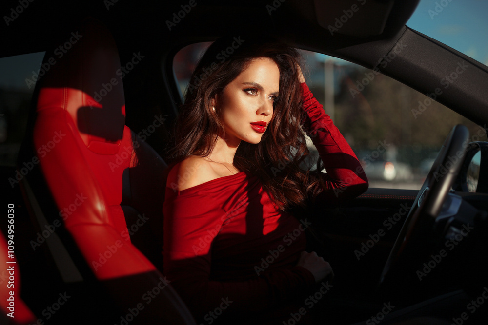 Beautiful Smiling woman driving car in red, attractive girl sitting in ...