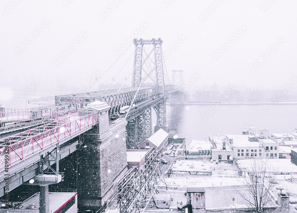 A snow covered New York City, rooftop view of the Lower East Side of ...