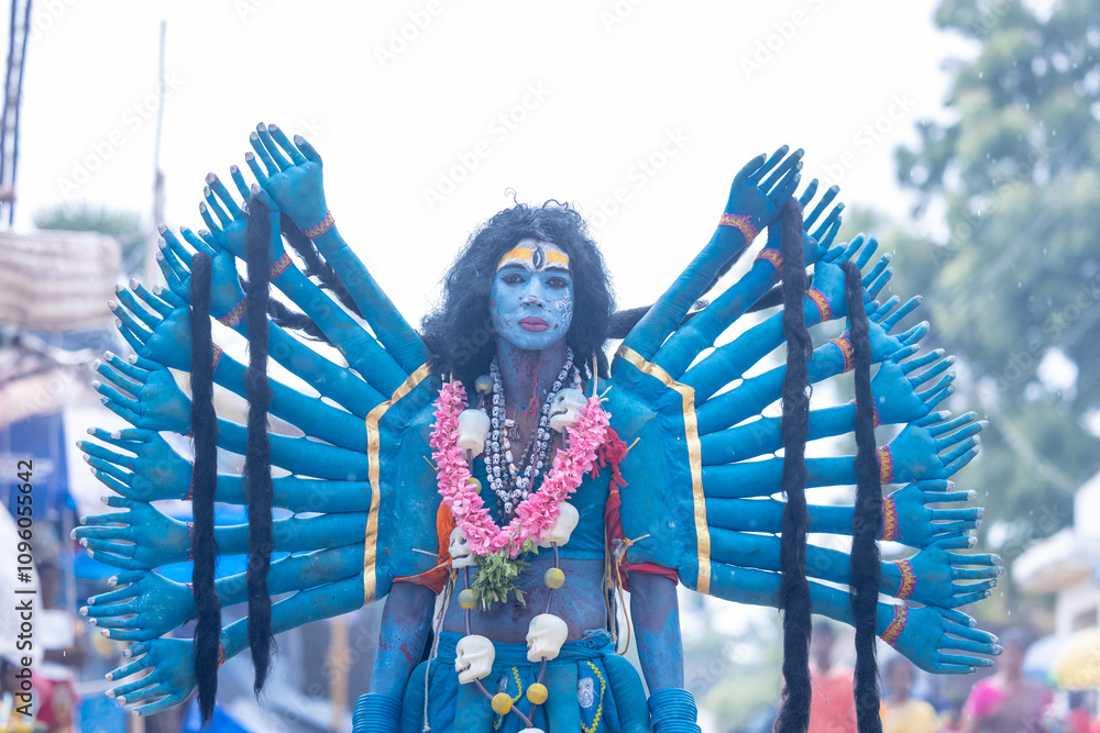 Kulasai Dasara, Portrait of indian male with painted face and dressed ...