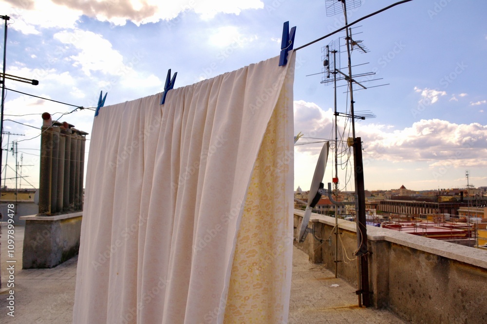 Laundry sheets Drying on a Rooftop in Rome, Capturing a Serene Urban ...