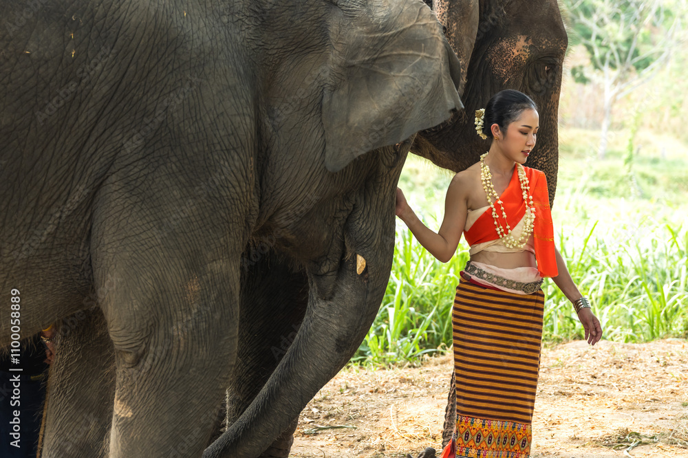 Pretty Thai woman in traditional Thai costume with friendly Asian ...