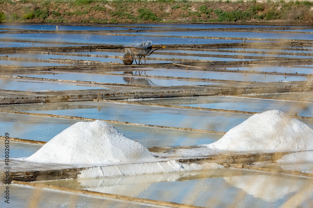 Sea salt production place with pyramidal piles of unrefined salt ...