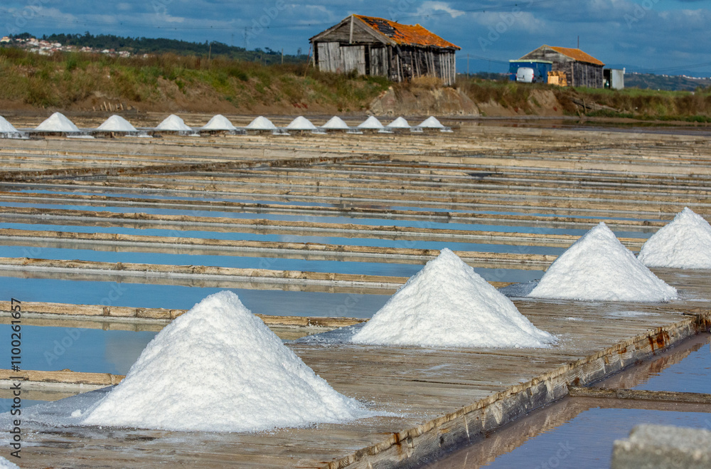 Sea salt production place with pyramidal piles of unrefined salt ...