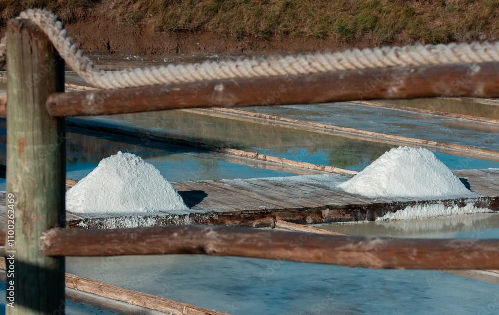 Sea salt production place with pyramidal piles of unrefined salt ...
