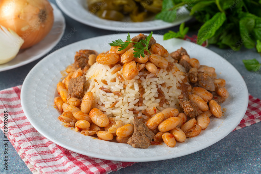 Traditional Turkish cuisine. Kuru Fasulye . Haricot Beans, rice and ...