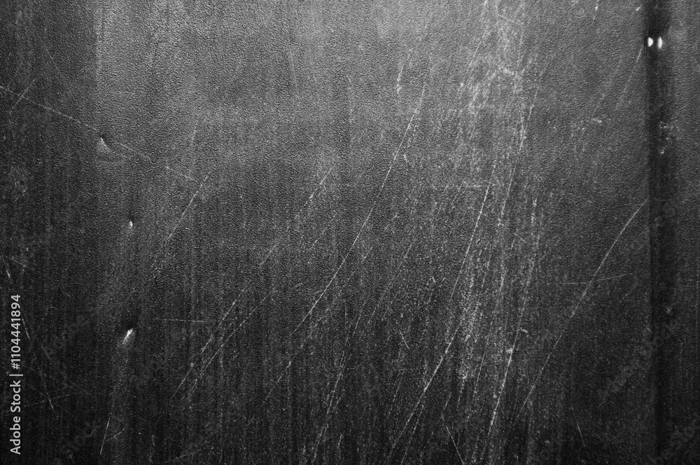 Surface displays scratches and marks from wear and tear over time in a dim setting Stock Photo ...